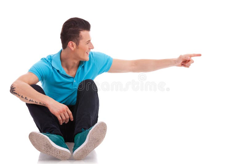 Man Pointing And Looking To Side Stock Photo - Image of shirt, beauty ...