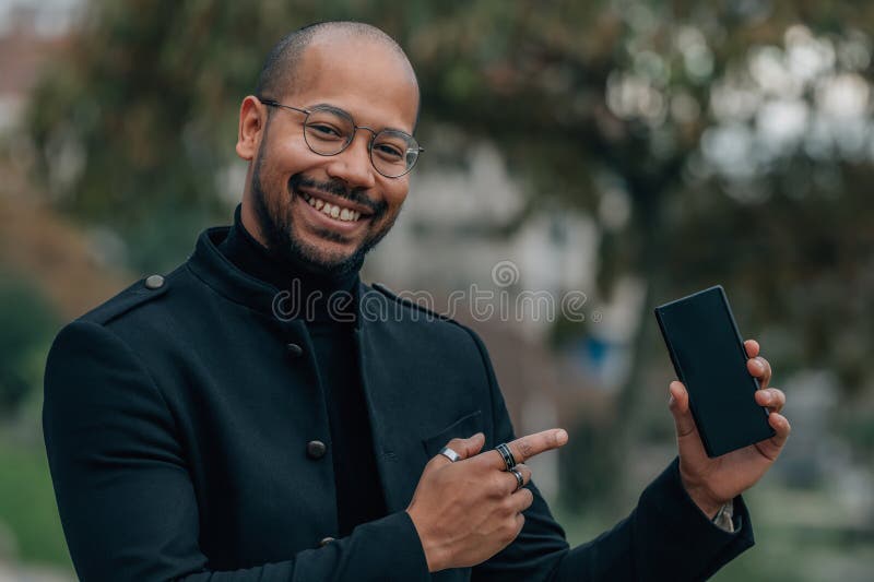 Man Pointing at Mobile or Cell Phone Stock Photo - Image of technology ...