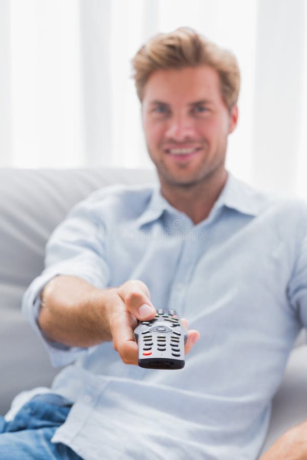 Man Pointing Remote Control Toward the Camera Stock Image - Image of ...