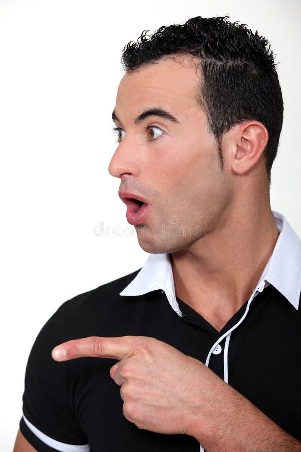 Man pointing at something stock photo. Image of positive - 37033728