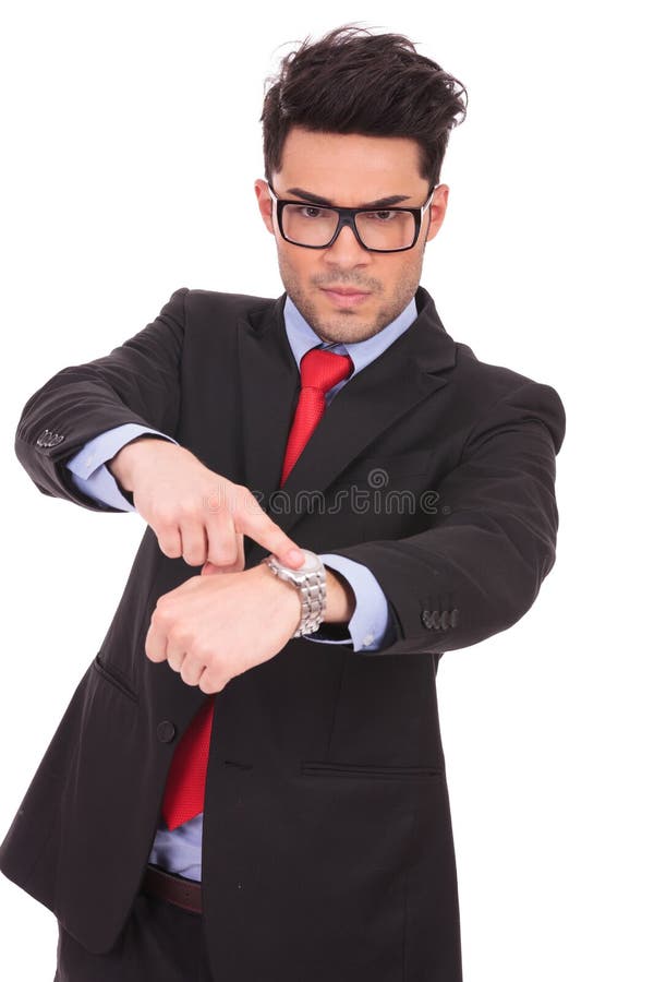 Man pointing to his watch stock photo. Image of confident - 29374432