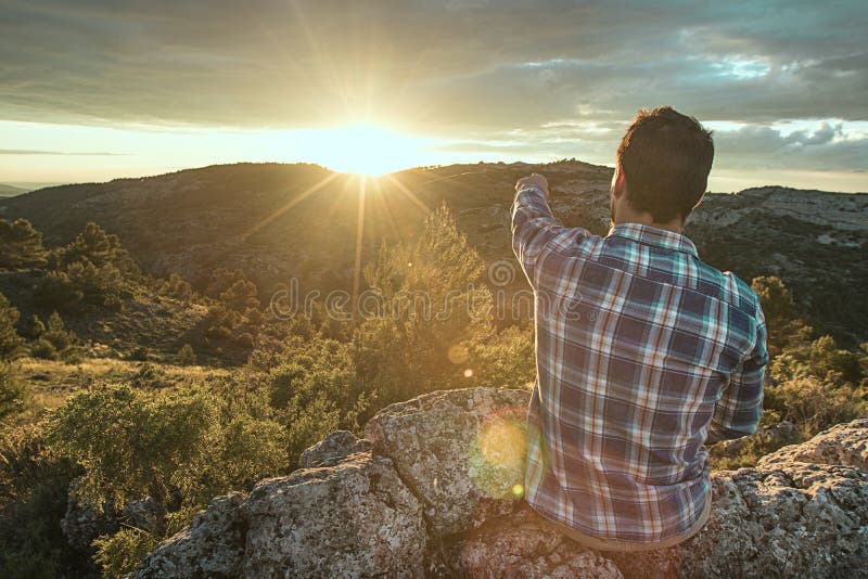Man pointing to the sun stock image. Image of freedom - 119977501