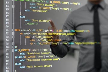 Man Pointing on Virtual Screen with Website Programming Code Stock ...