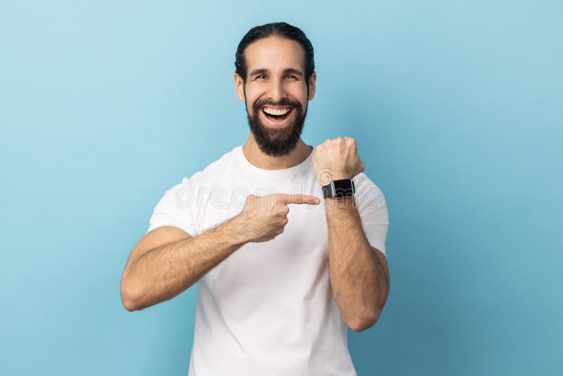 Man Pointing Wrist Watch and Expressing Optimism about Time, Not Busy ... Man Pointing Wrist Watch and Expressing Optimism about Time, Not Busy ...