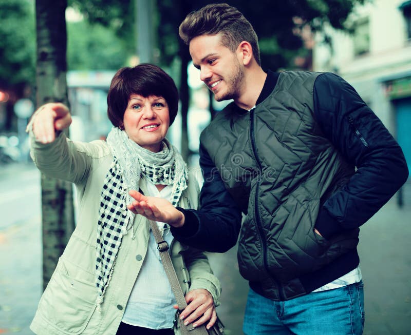 Man points the direction stock photo. Image of girl, people - 92533776