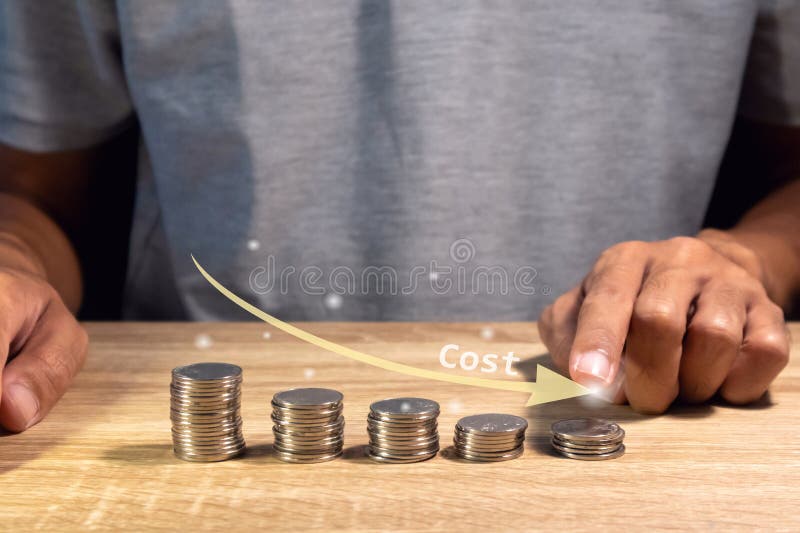 A Man Points at a Stack of Coins with a Down Arrow. Cost Reduction ...