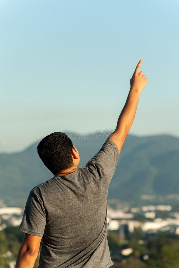 Man points up stock photo. Image of hands, blue, travel - 238816004