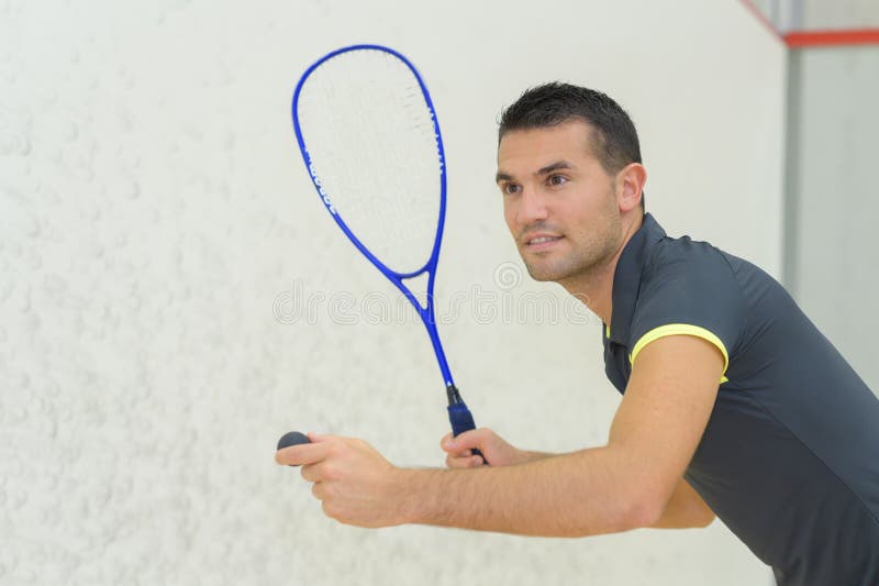 Man Poised To Serve Playing Squash Stock Image - Image of fitness ...