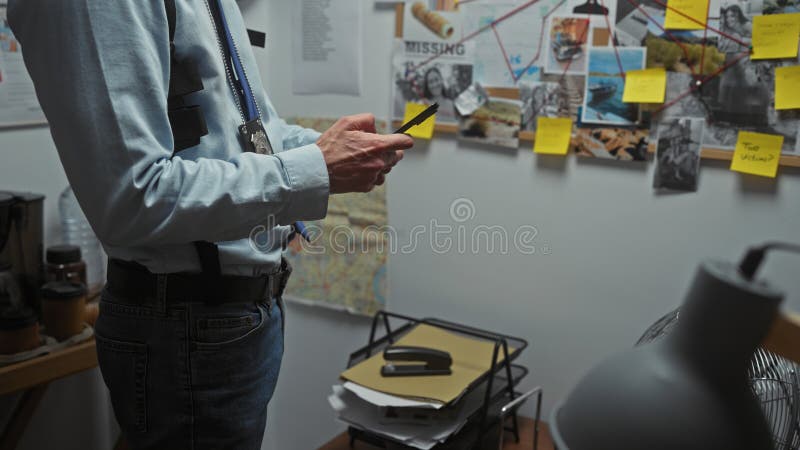 A Man in a Police Station Analyzing a Crime Evidence Board with Photos ...