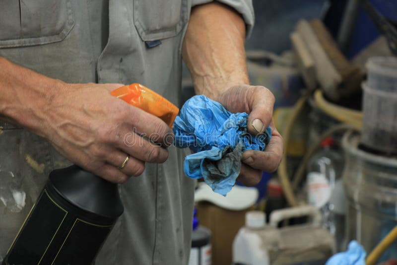 Man polishing a car stock photo. Image of tool, mechanic - 99180040