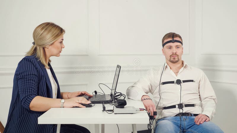 Man on Polygraph Test stock image. Image of crime, suspect - 261425873