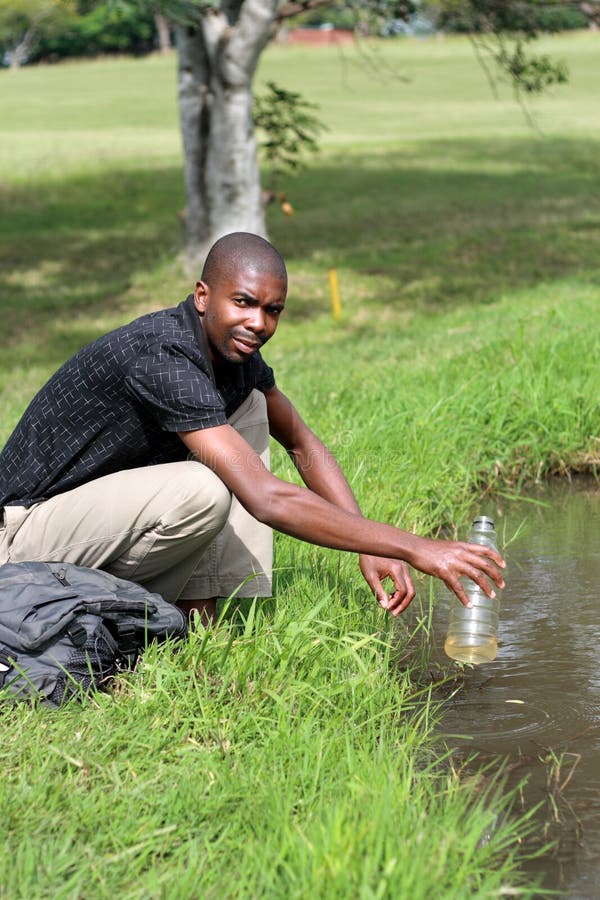 Man by pond stock image. Image of hiking, hike, landscape - 5101313