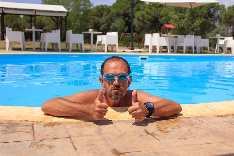 Man in the pool stock image. Image of happy, hand, athlete - 26508145