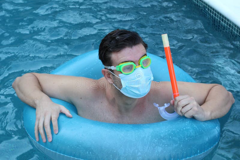 Man in the Pool with Surgical Mask Stock Image - Image of pool, goggles ...