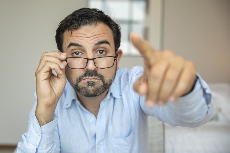 Man with a poor eyesight stock image. Image of glasses - 224349185