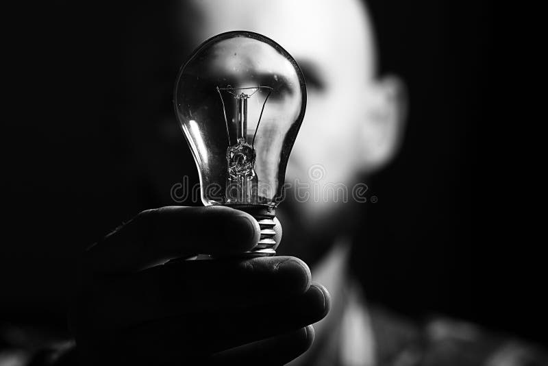 Man Portrait with Light Bulb Stock Photo - Image of happy, levitation ...