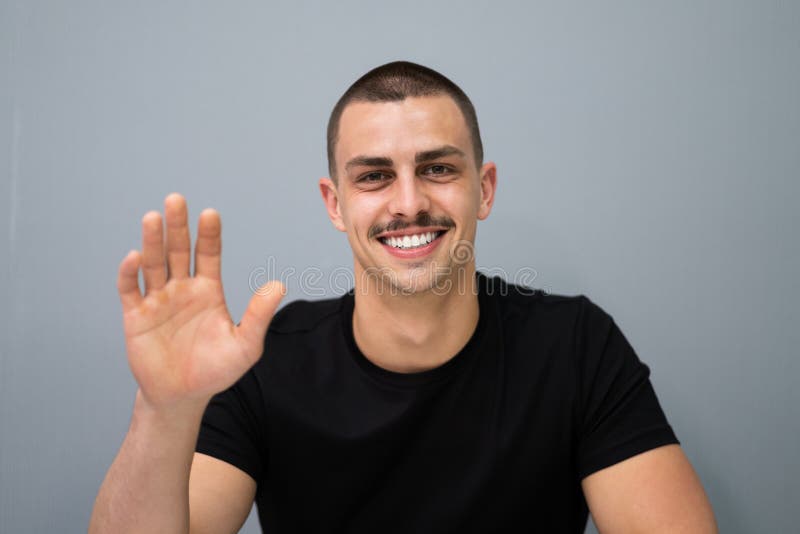 Man Portrait Waving Hello stock photo. Image of handsome - 212503450