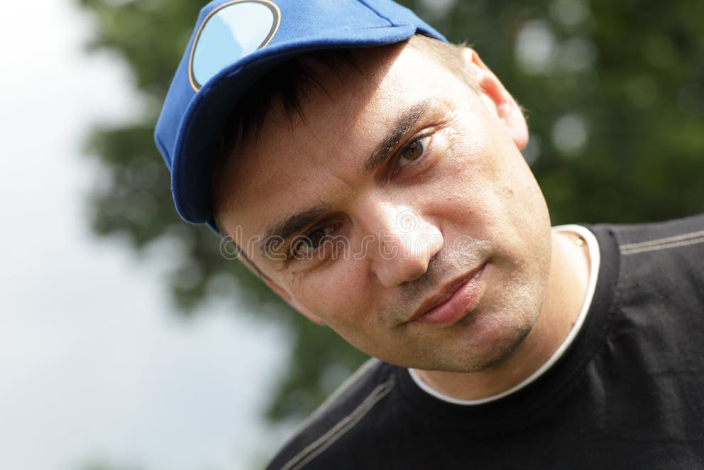 Man poses in cap stock photo. Image of happy, male, head - 21263626