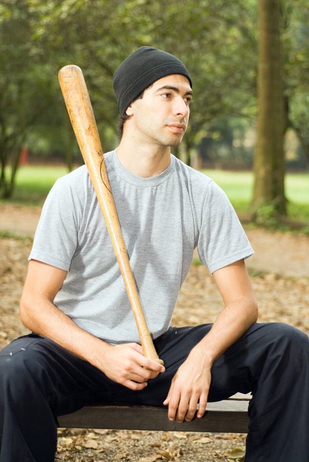 Man Sitting Baseball Bat Vertical Stock Photos - Free & Royalty-Free ...