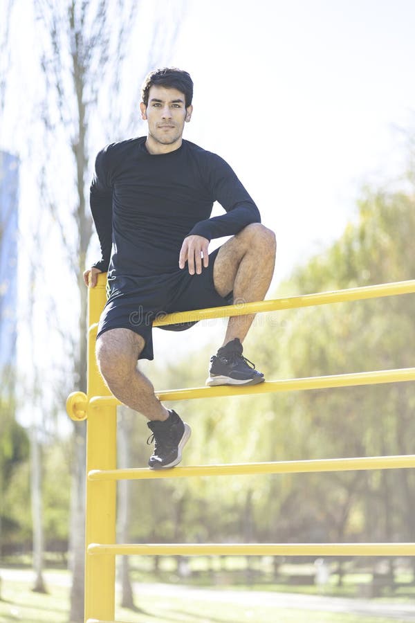 Man Posing after Doing Climbing Vertical Exercise in the Park Stock ...