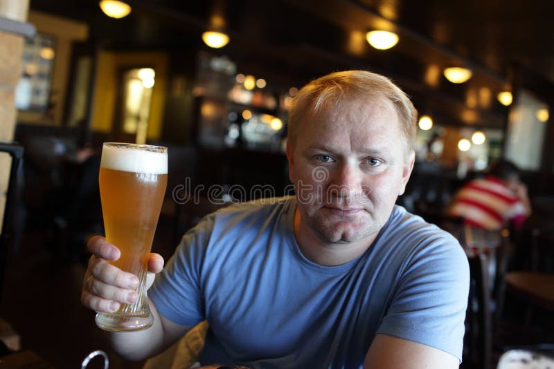 Man Posing with Glass of Beer Stock Image - Image of adult, indoor ...