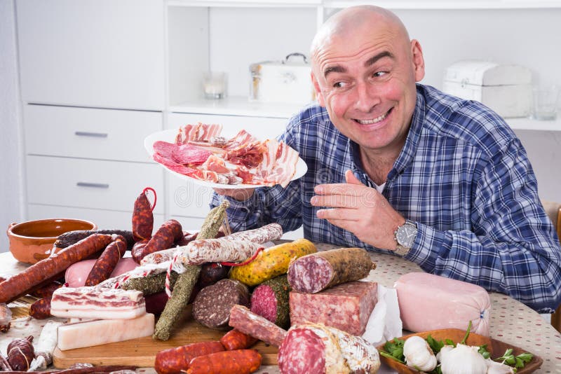 Man Posing with a Plate of Cold Cuts Stock Image - Image of pickled ...