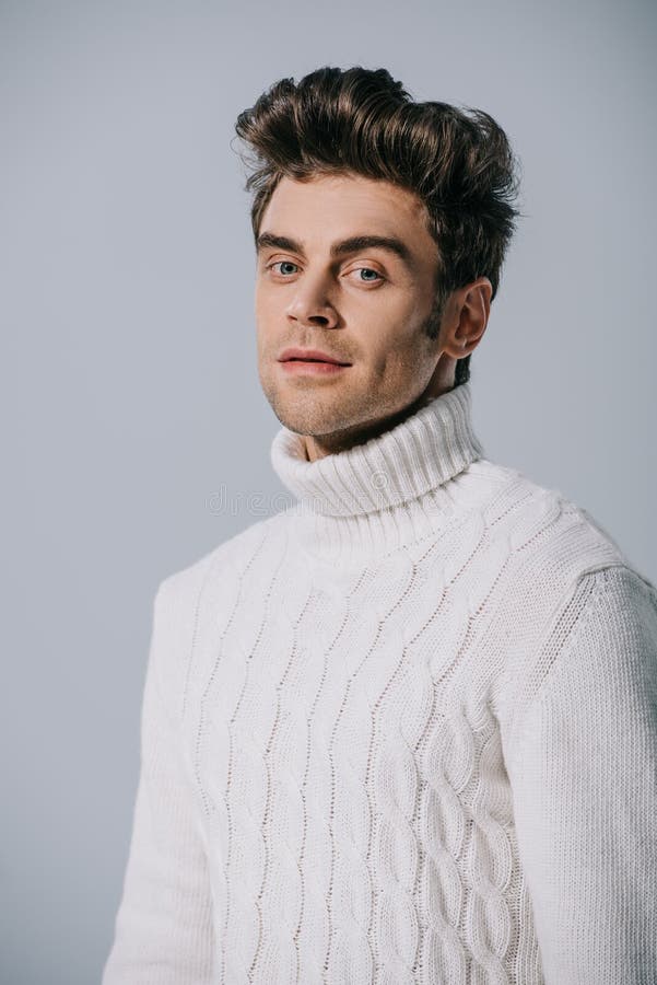 Man Posing in White Knitted Sweater, Isolated on Grey Stock Photo ...