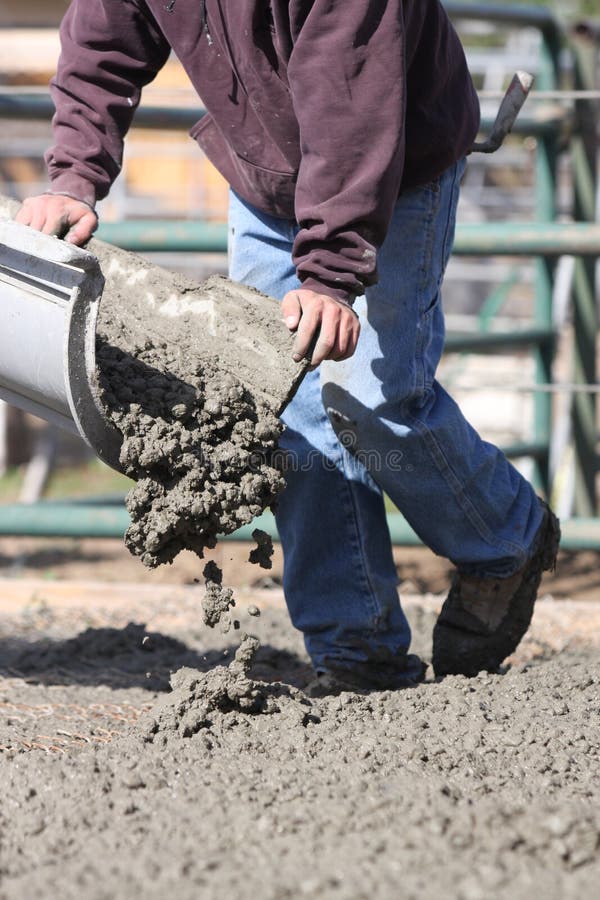 Worker Directs the Flow of Concrete Stock Image - Image of materials ...