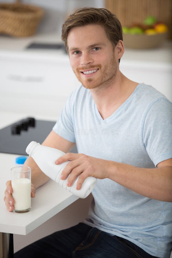 Man Pouring Glass Cold Milk Stock Photo - Image of glass, protein ...