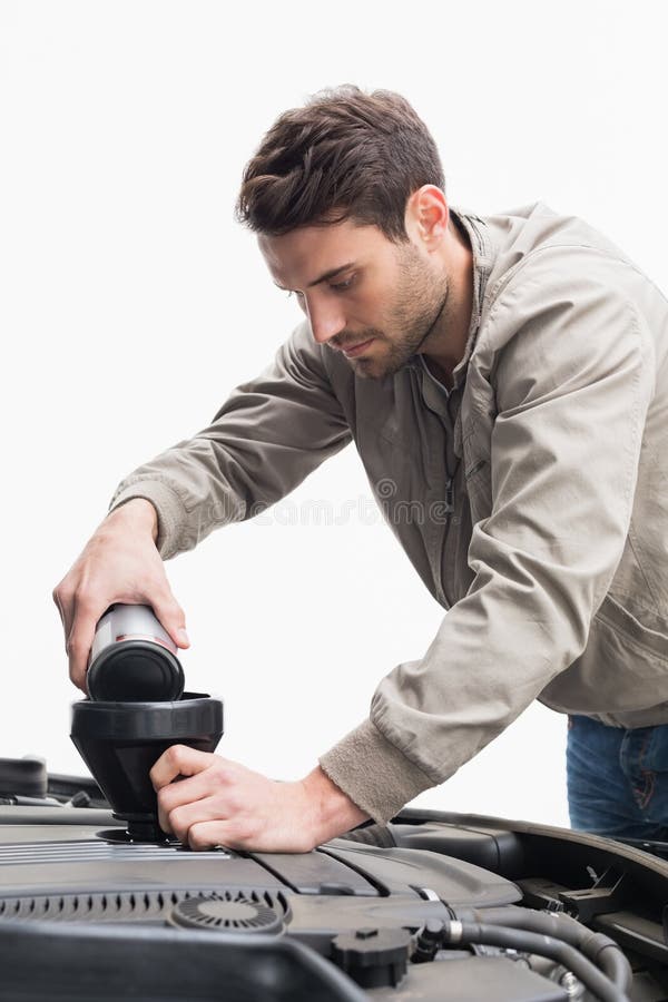 Man Pouring Oil into Engine Stock Image - Image of caucasian, young ...