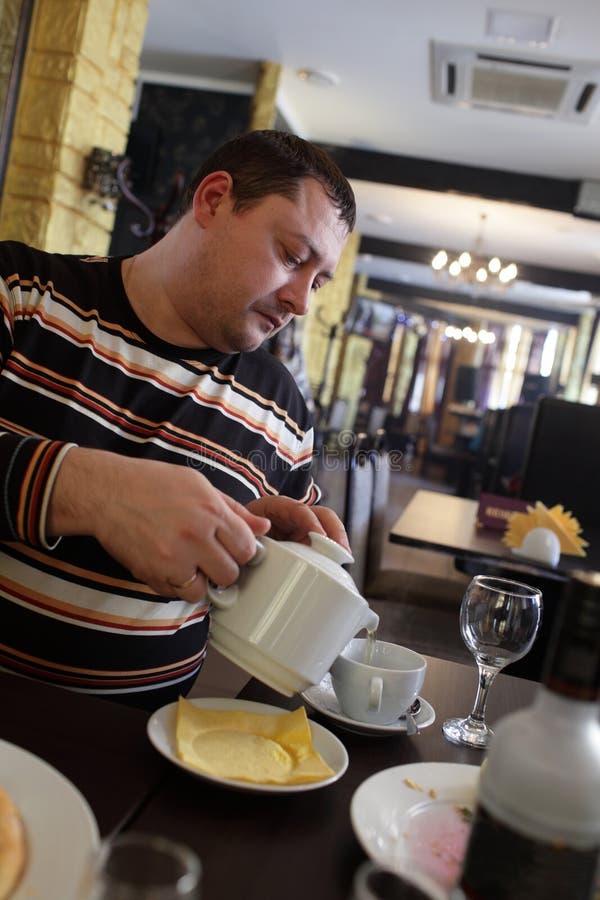 Man pouring tea stock photo. Image of human, indoor, glasses - 30133768