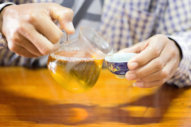Man pouring tea stock image. Image of medicine, lifestyles - 91056287