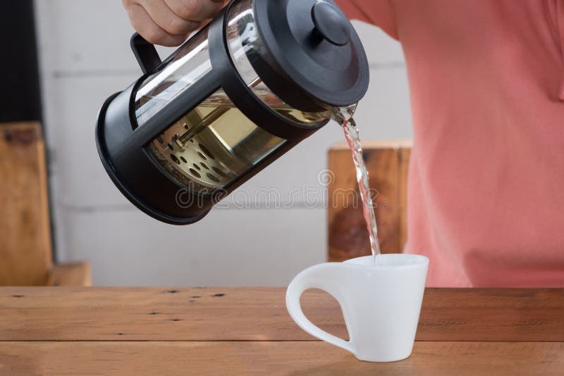 Man pouring tea stock image. Image of breakfast, family - 66433179
