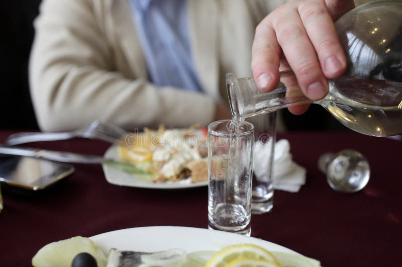 Man pouring vodka stock image. Image of russian, male - 24212725