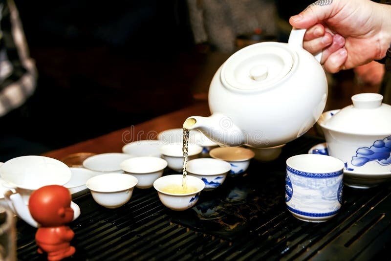 A Man Pours Tea during a Tea Ceremony Stock Photo - Image of asia ...