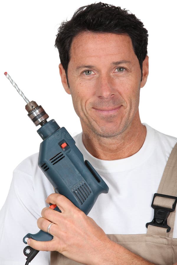Man with power drill stock image. Image of wielding, white - 33284373