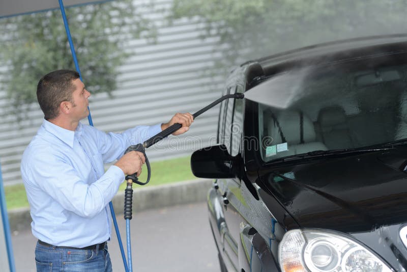 Man power washing vehicle stock image. Image of care - 127763959
