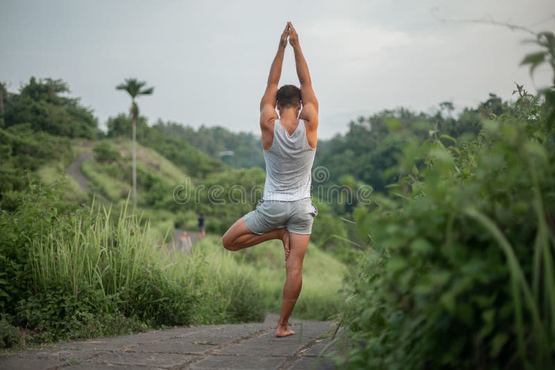 Man Practice Yoga Practice and Meditation Outdoor Stock Image - Image ...