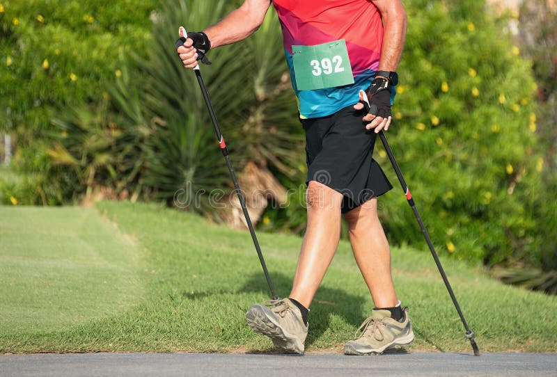 Man Practices Nordic Walking Sport on the Park Stock Photo - Image of ...
