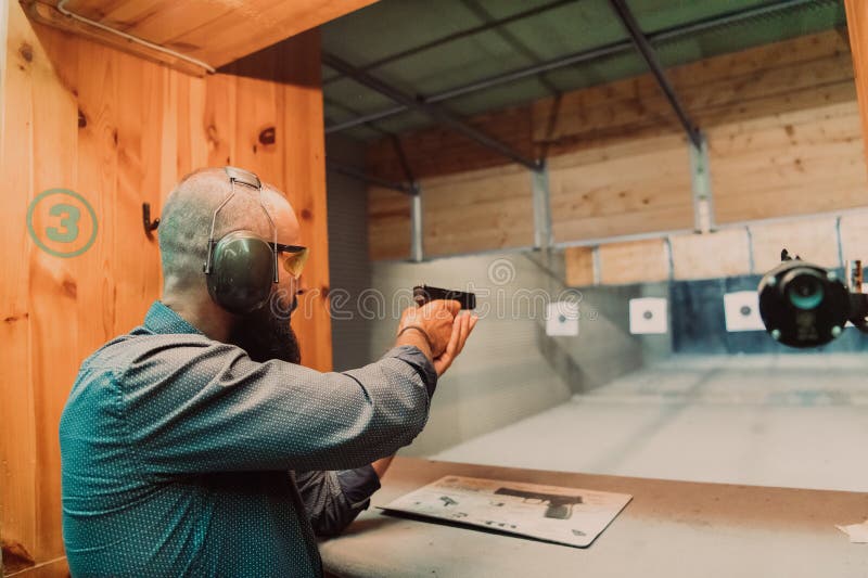 133 Man Shooting Indoor Range Stock Photos - Free & Royalty-Free Stock ...