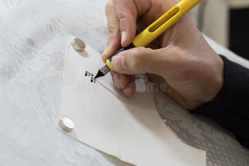 Hand Practices Decorating Letters from a Torah Scroll Written on ...