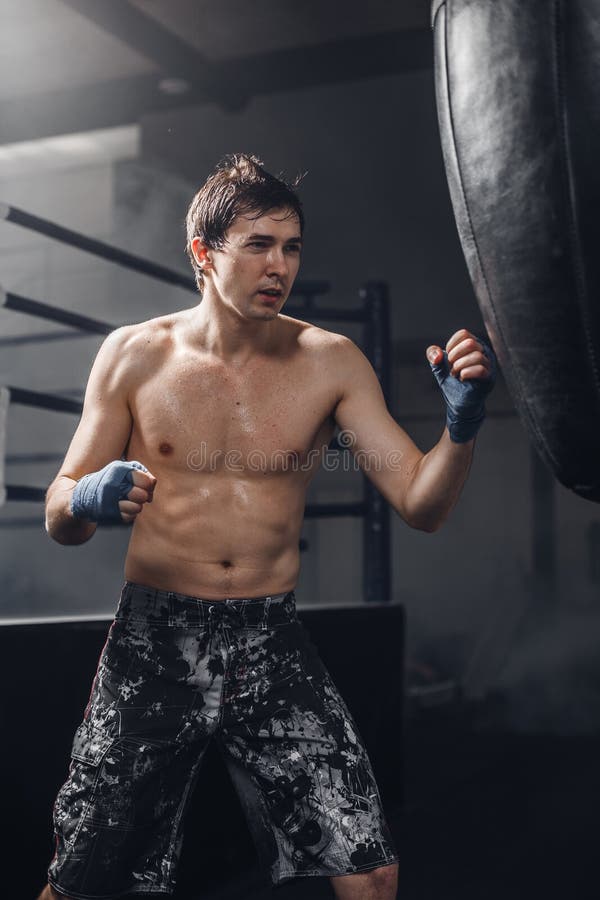 Man Practicing Boxing on Big Black Bag in Gym Stock Image - Image of ...