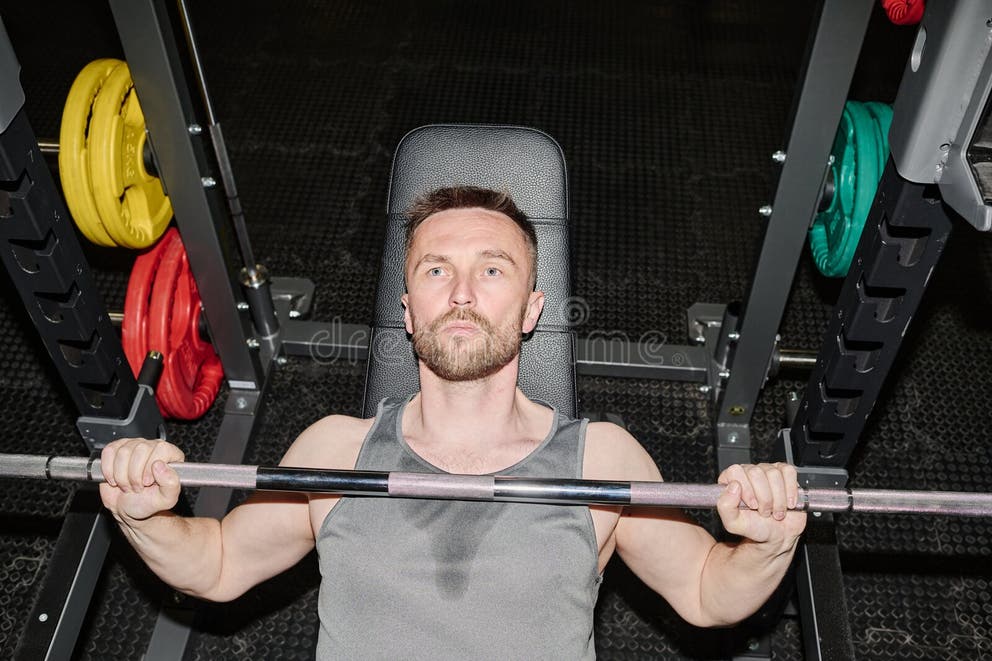 Man Practicing Chest Press stock photo. Image of sweaty - 332516664