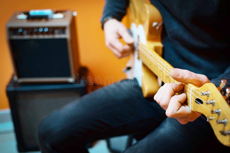 Man Practicing Electric Guitar Playing. Guitar Lesson Stock Image ...