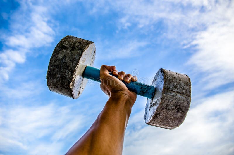 Man Practicing with a Old Dumbbell. Exercise for Good Health Stock ...
