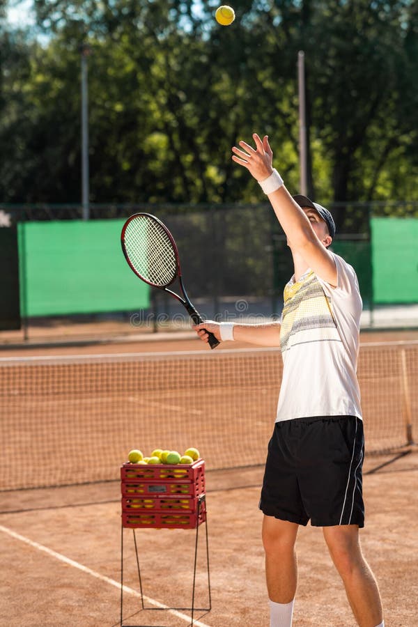 Man Practicing Playing Tennis. Tennis Player Serves. Stock Image ...
