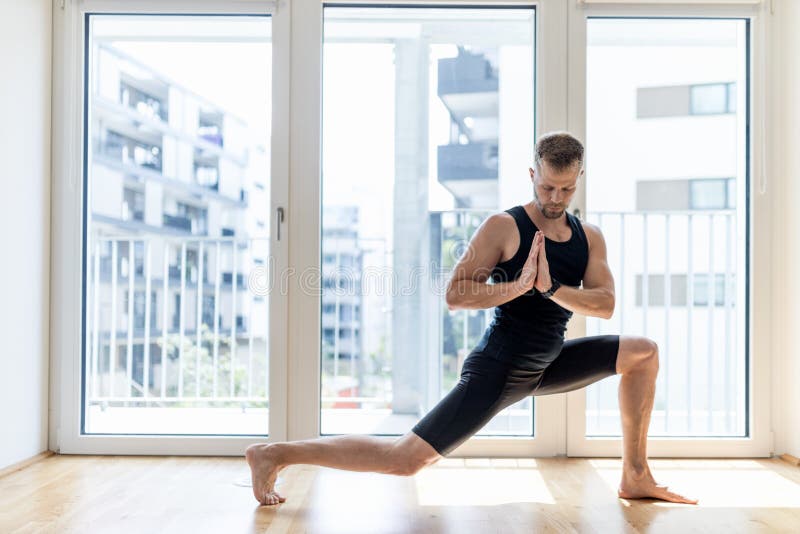 Man Practicing Yoga at His Home Stock Image - Image of morning ...