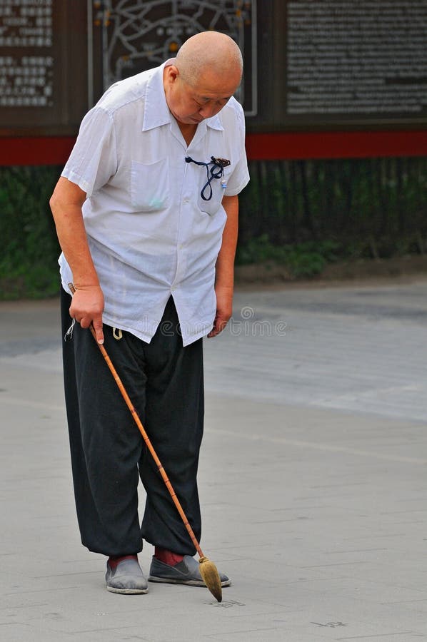 Man Writing Chinese Calligraphy Stock Photo - Image of paintbrush ...