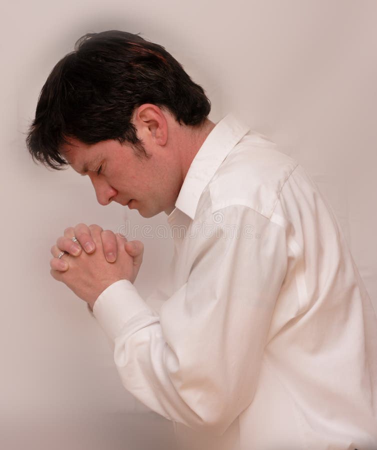 Man Praying stock image. Image of prayer, bowed, praying - 5067983