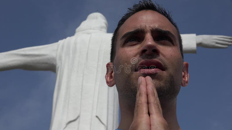 Man Praying at Cristo Rey Statue Stock Footage - Video of christian ...